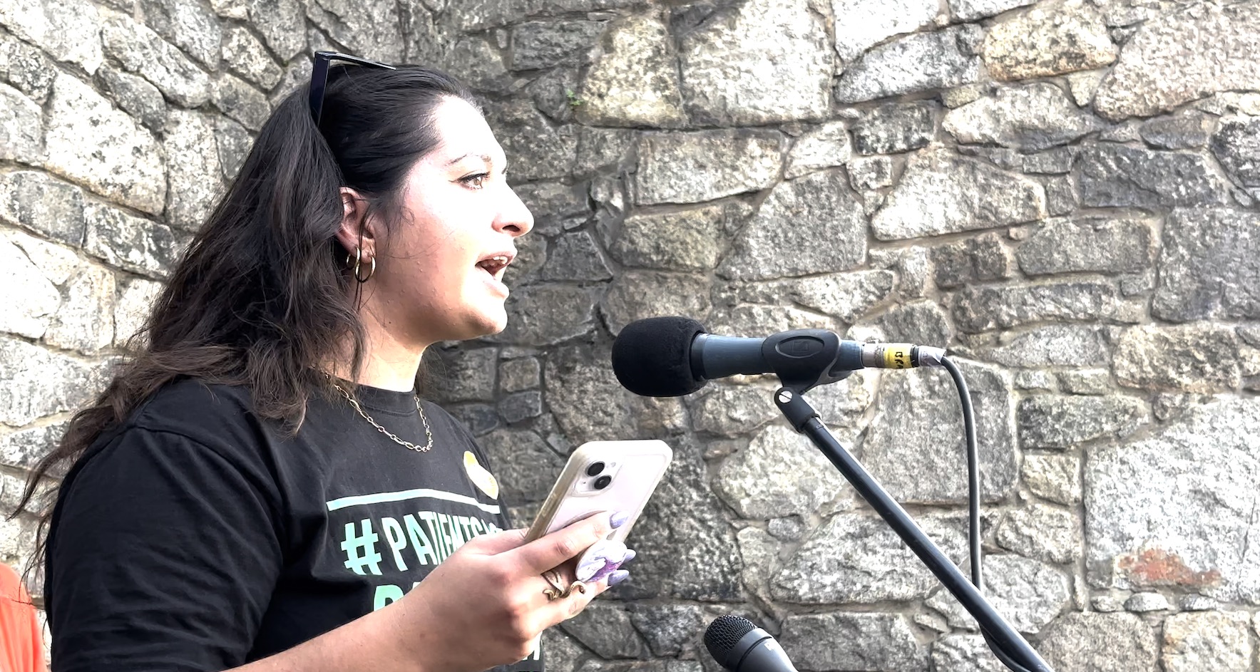 Aliya Yule speaks at the end of the demonstration to save Liverpool ...